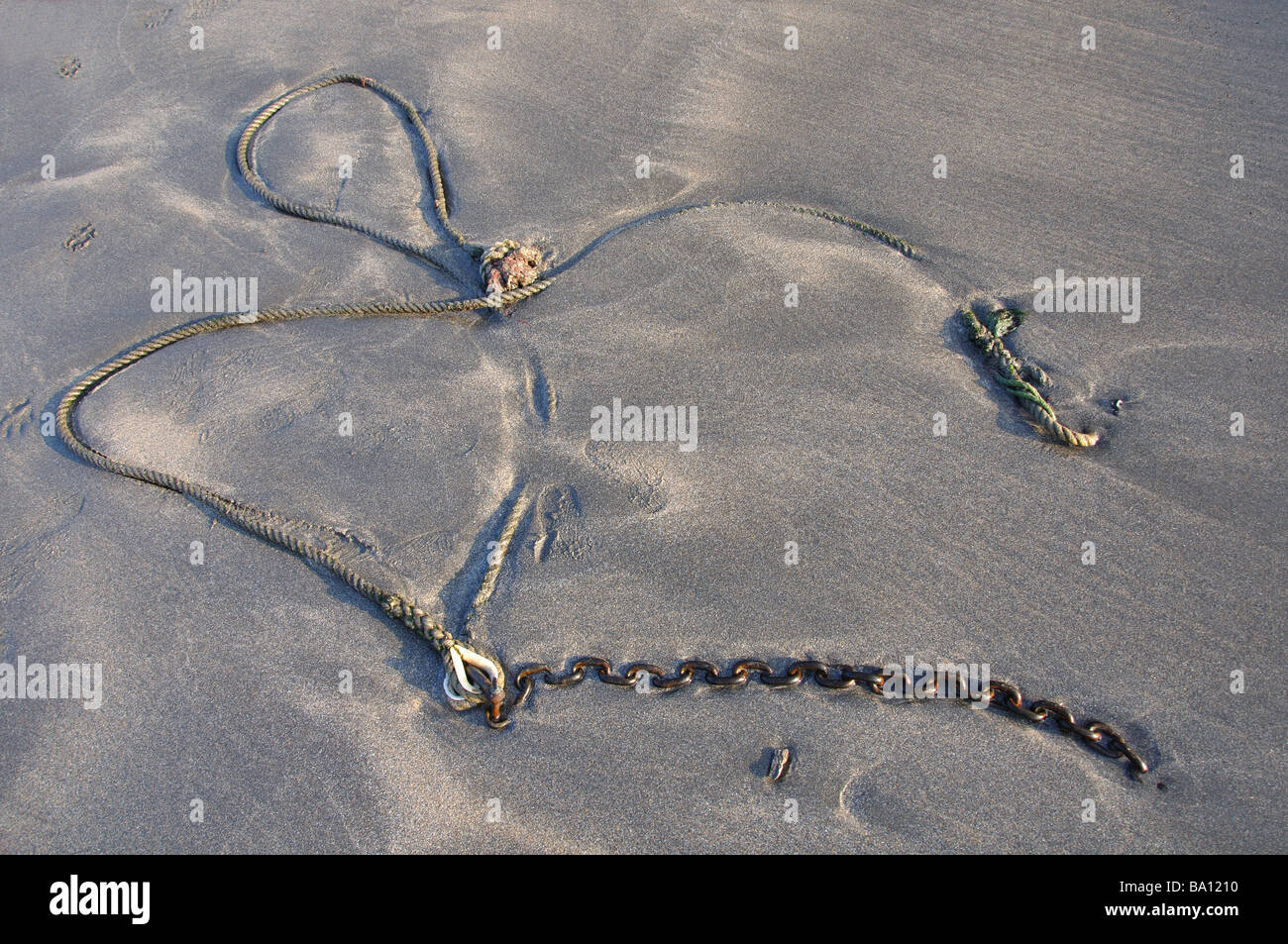 Rope and chain on beach Stock Photo - Alamy