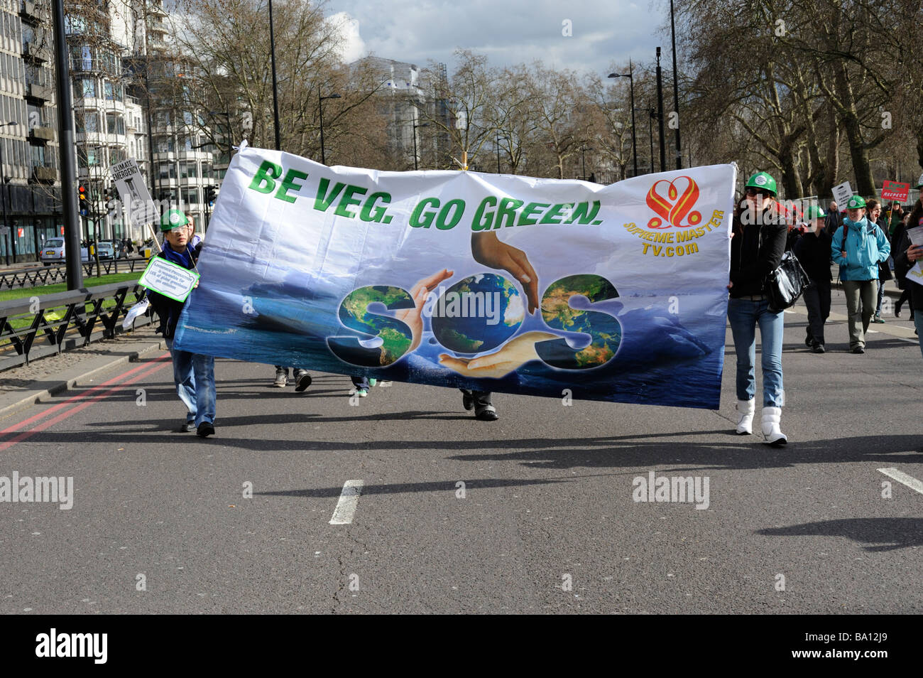 Vegetarian banner on G20 protest march,28th March 2009 Put People First ...