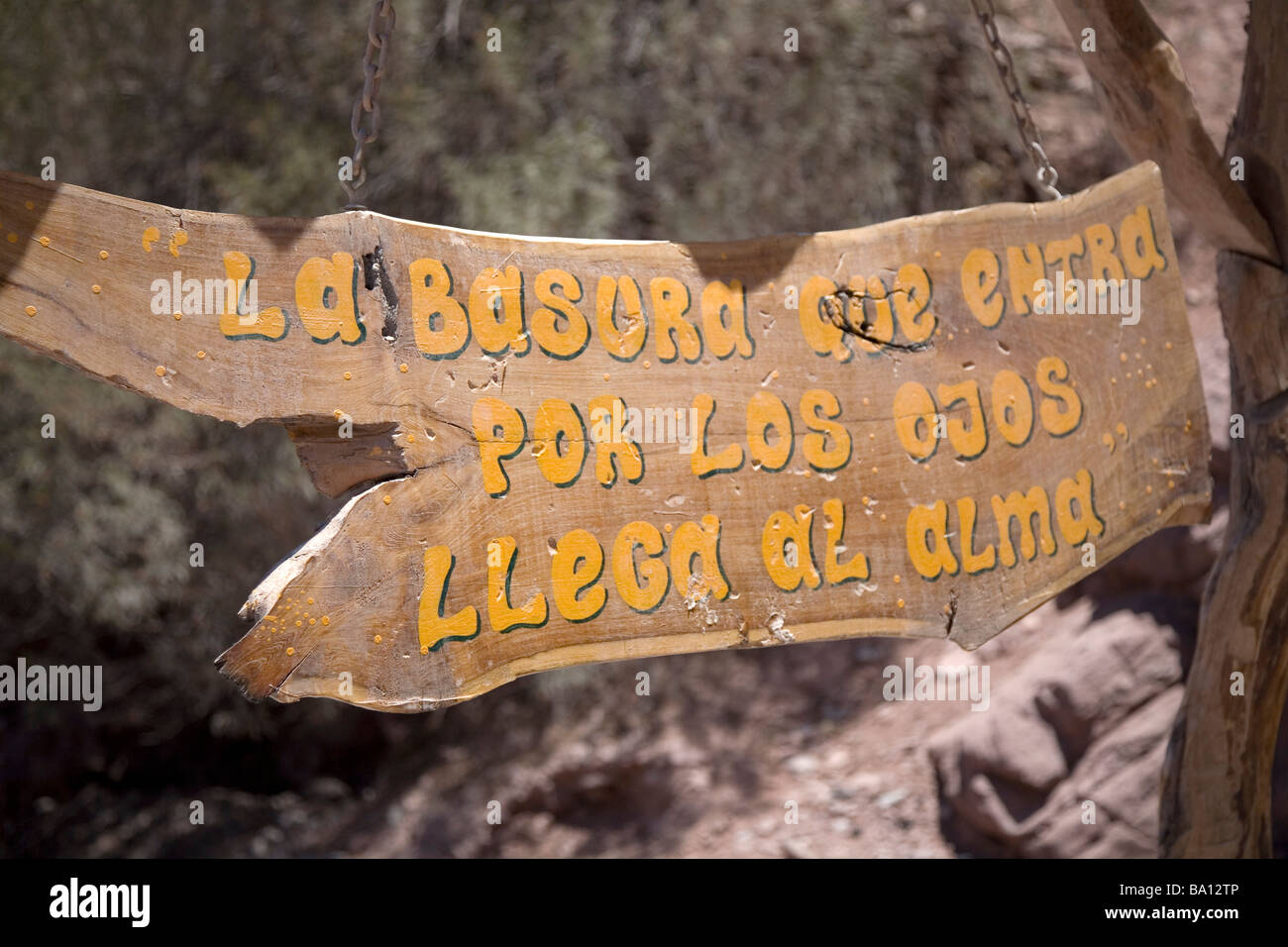 Sign in Cafayate Gorge that reads "What enters through the eyes, leaves ...