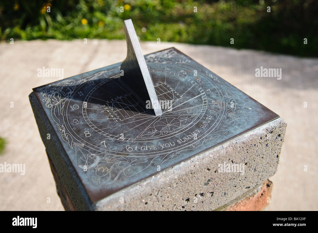 Sundial in a Country Park formal garden Stock Photo - Alamy