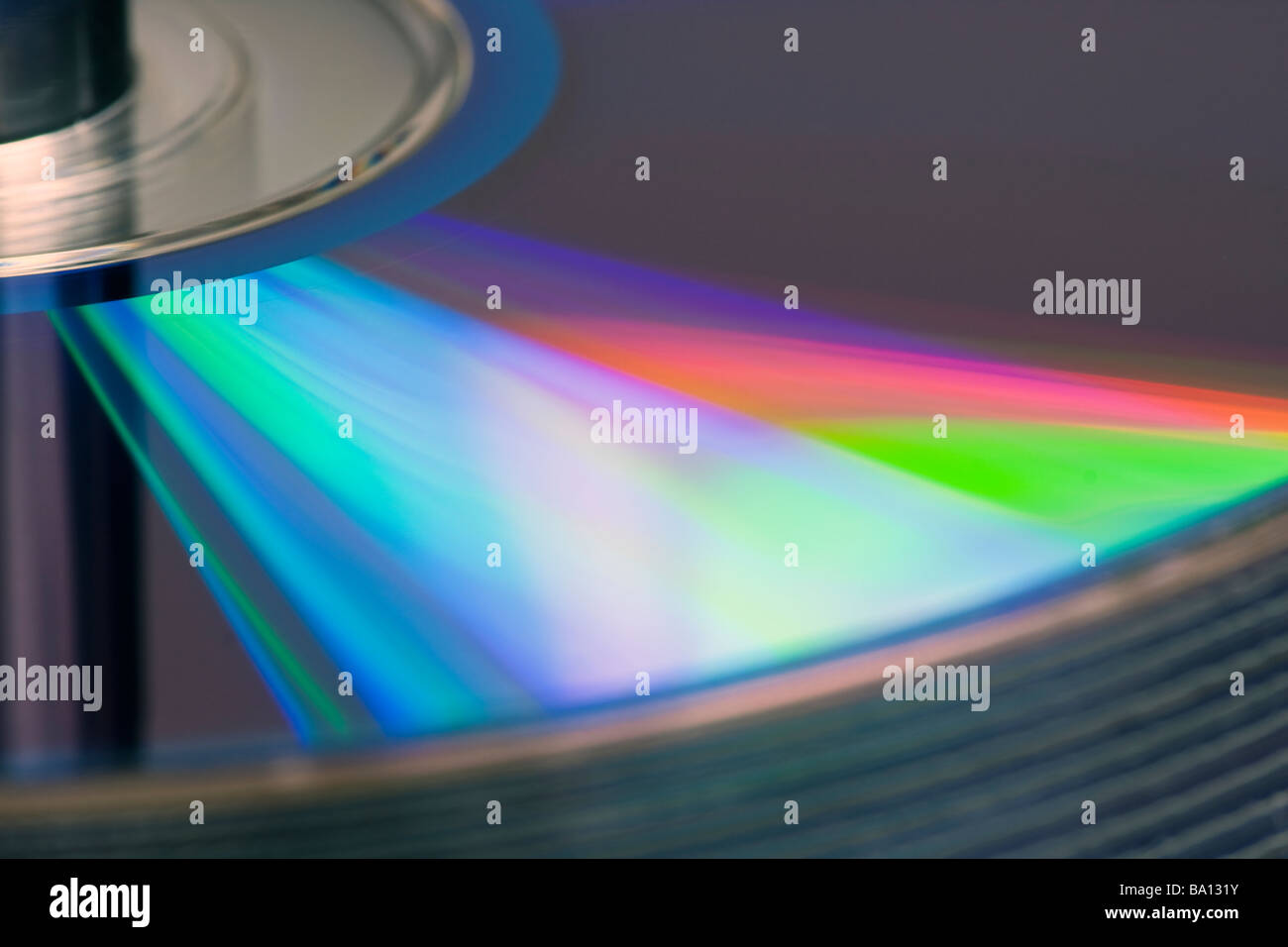 Stack of compact disks shining in the light Stock Photo - Alamy