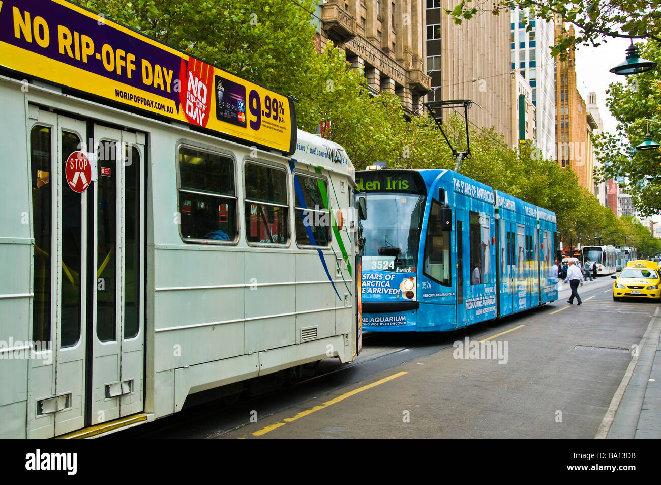 Trams on a street Melbourne Victoria Australia Stock Photo - Alamy
