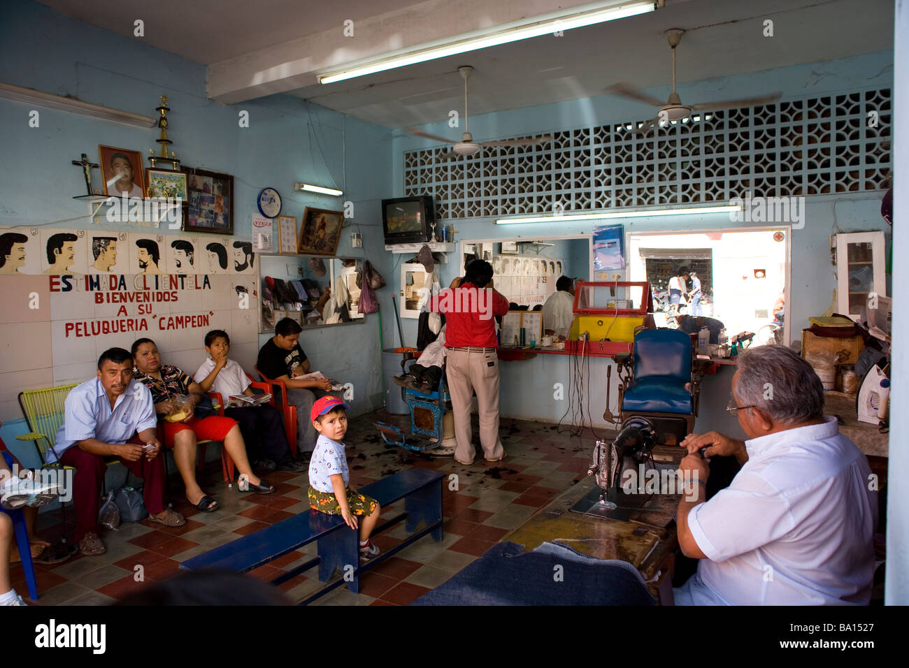Traditional Barber Shop With Old Decoration And Customers Waiting To Be ...