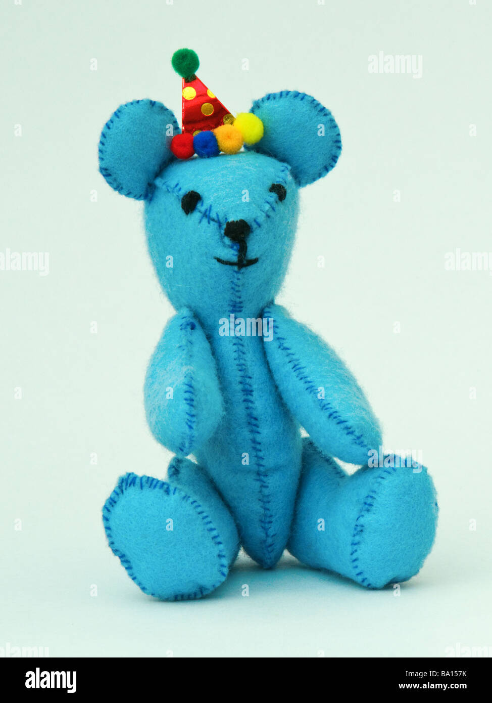 Miniature teddy wearing a jolly hat (Mini Bear Collection Stock Photo ...