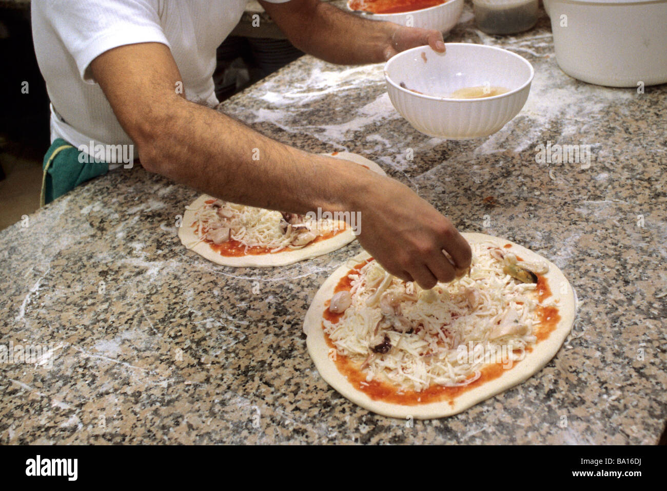 Preparation of the pizza Stock Photo - Alamy