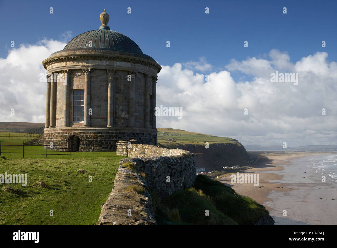 Mussenden Temple on the clifftop overlooking benone beach and downhill ...