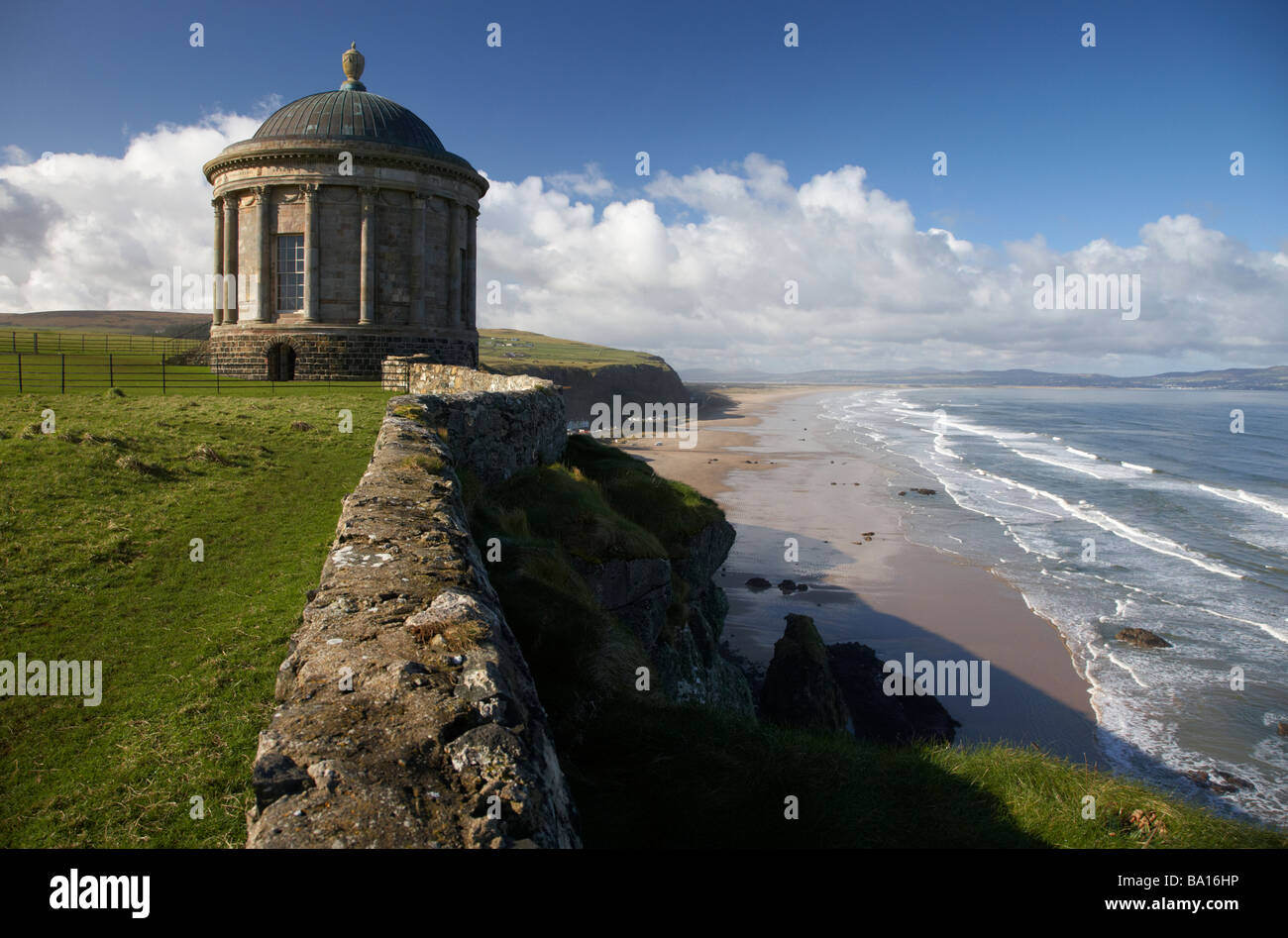 Mussenden Temple on the clifftop overlooking benone beach and downhill ...