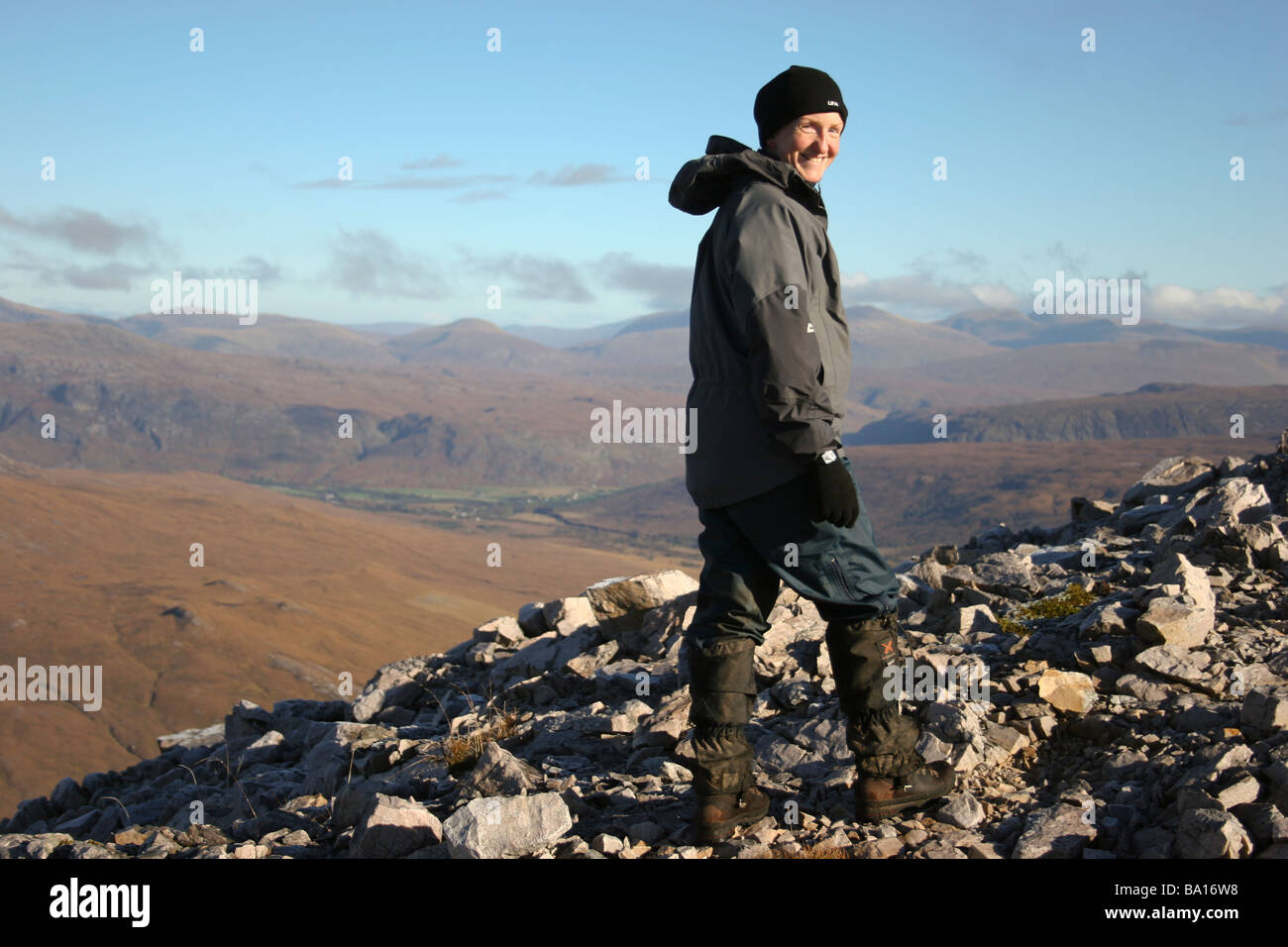 lady in mountains walking torridon scotland Stock Photo - Alamy
