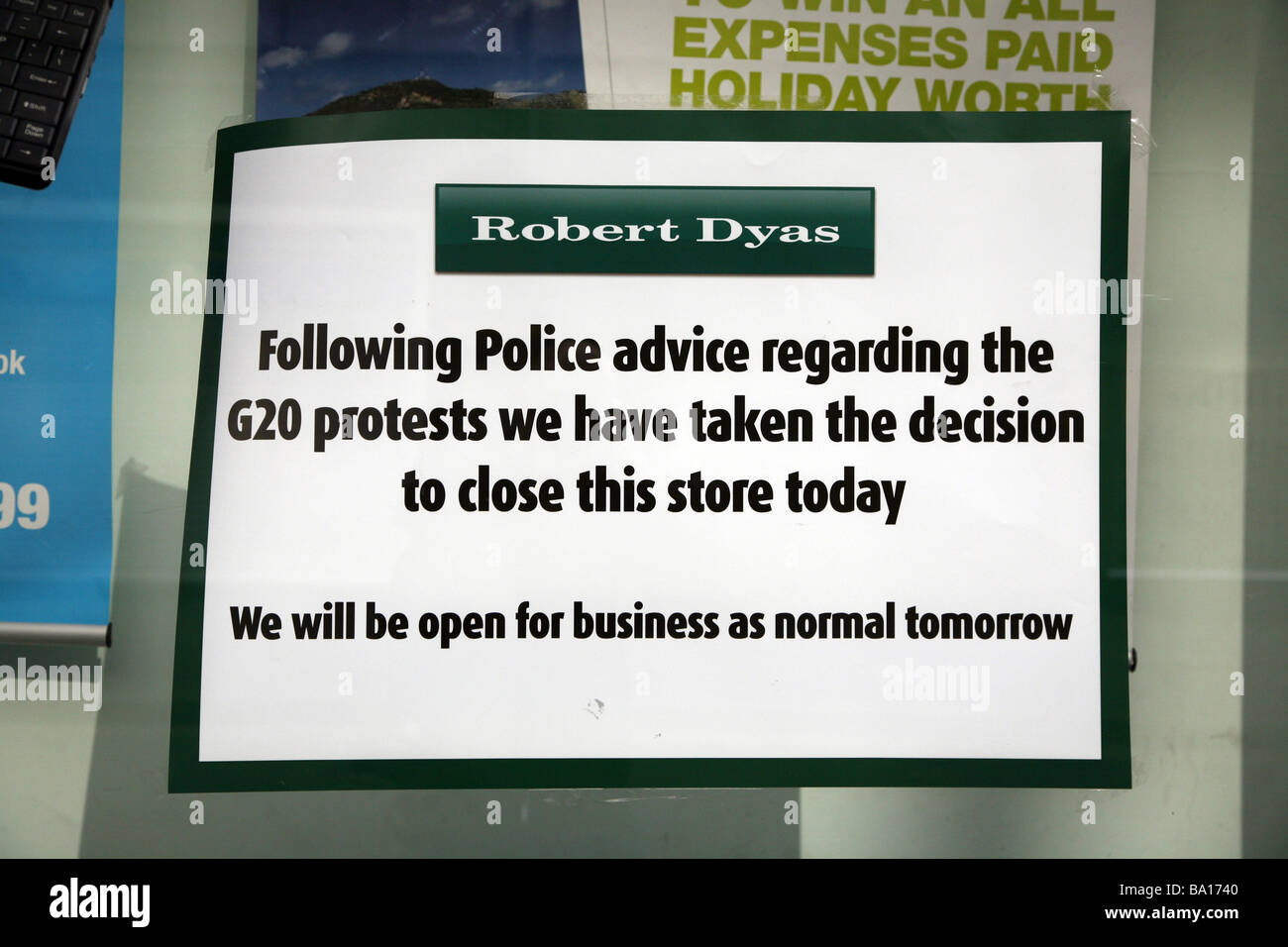 A notice in a closed shop window before the G20 protests in London ...