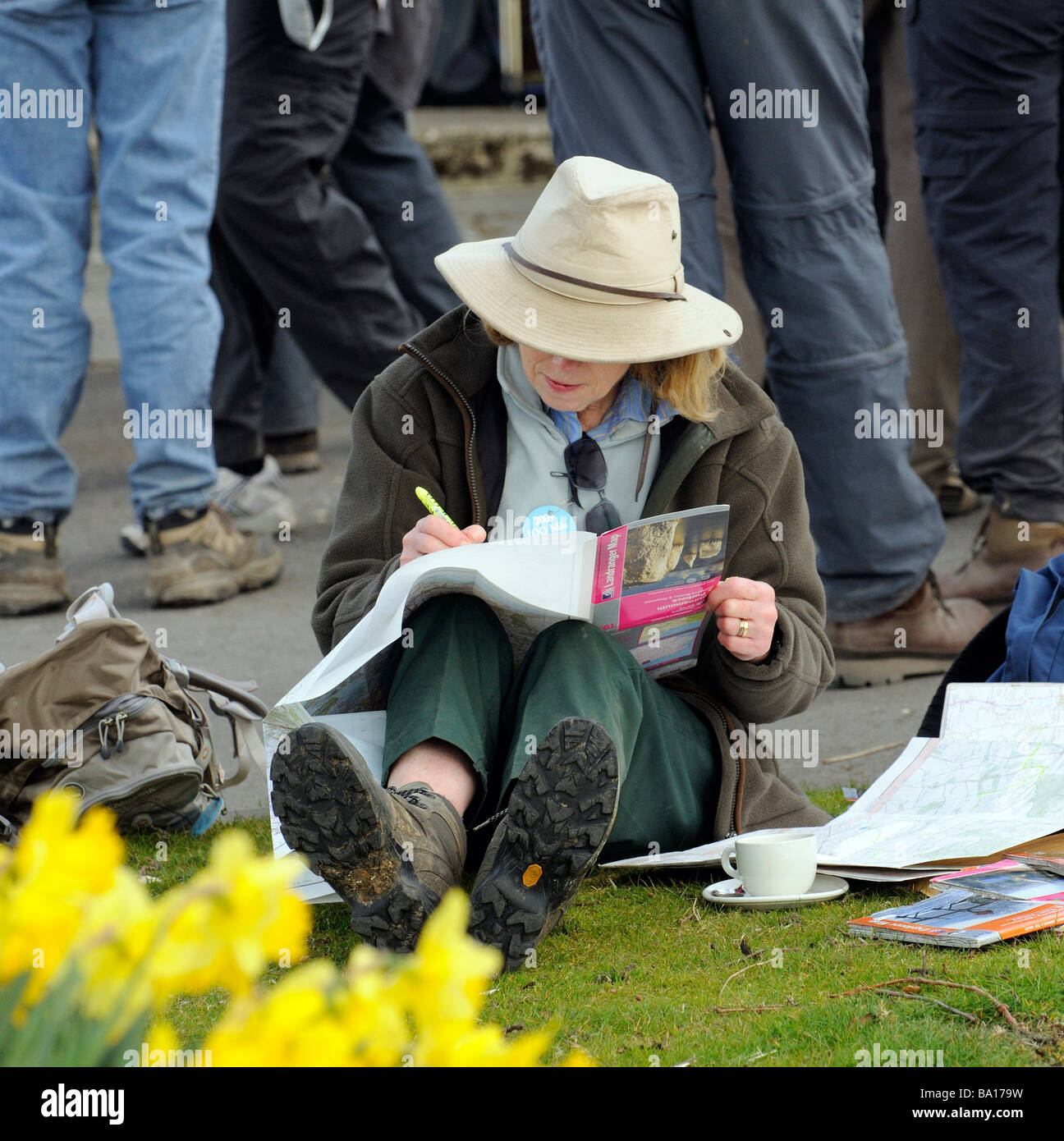 Female walker checking map hi-res stock photography and images - Alamy