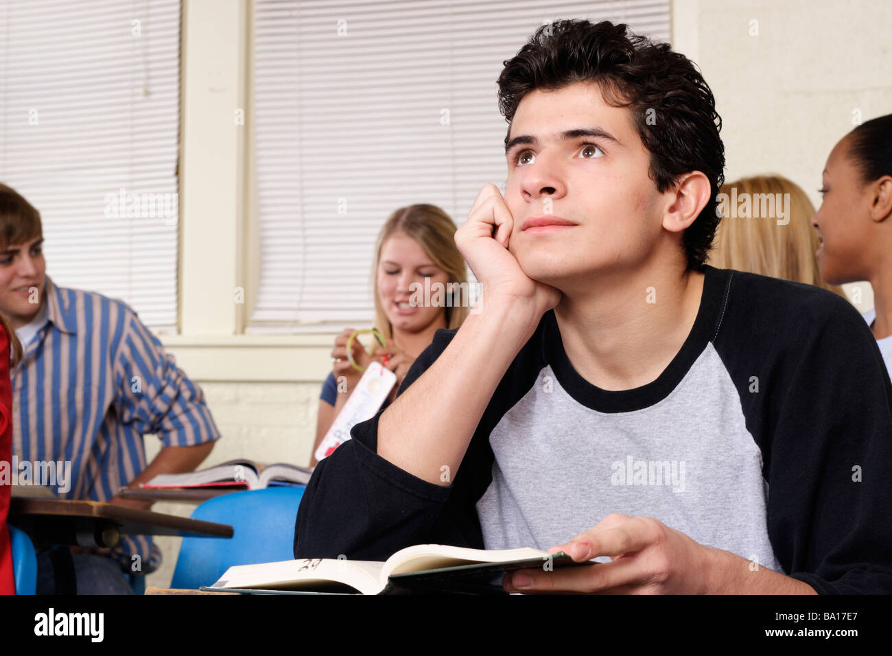 Student at desk daydreaming instead of studying Stock Photo - Alamy Student at desk daydreaming instead of studying Stock Photo - Alamy