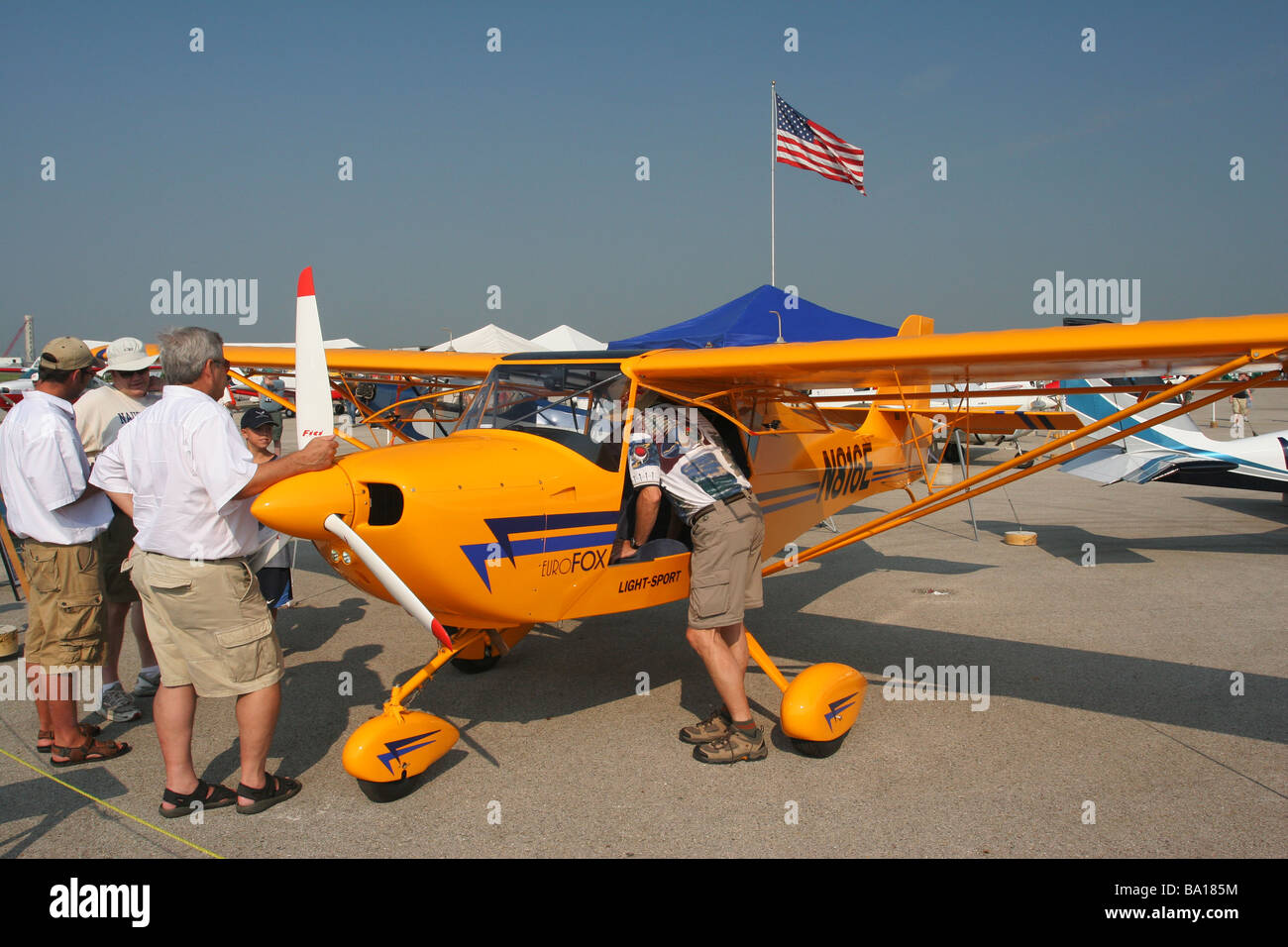 Men Investigating a Euro Fox Light Sport Airplane Displayed at Dayton ...