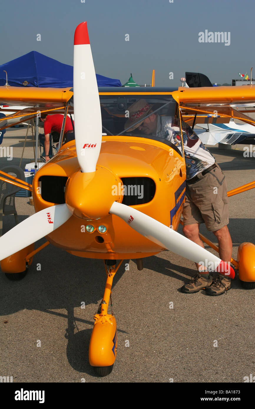 Man Investigating a Euro Fox Light Sport Airplane Displayed at Dayton ...