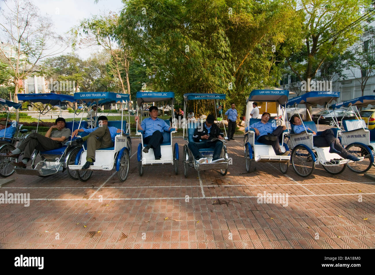 cyclo drivers at rest in Hanoi Vietnam Stock Photo - Alamy