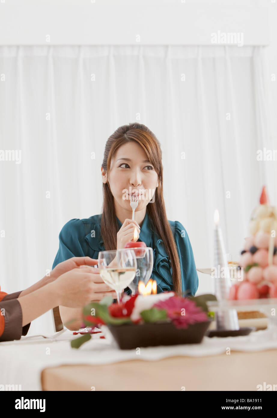 A woman eating Stock Photo - Alamy