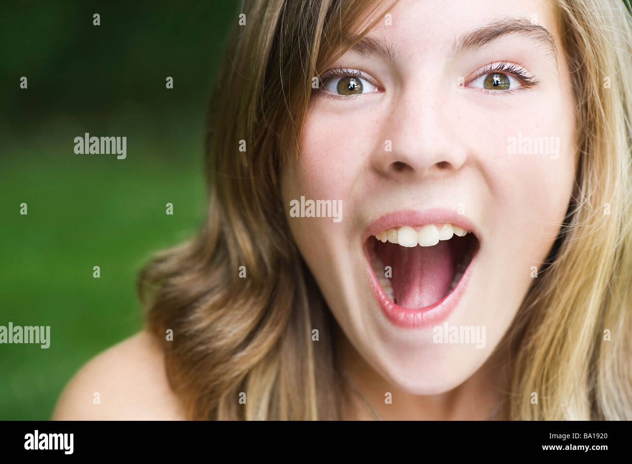 Teenage girl with surprised look Stock Photo - Alamy