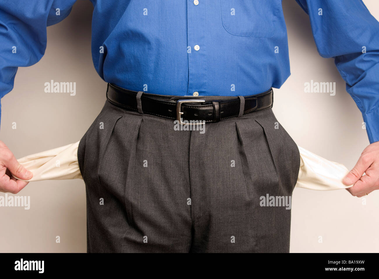 MAN WITH EMPTY POCKETS Stock Photo - Alamy
