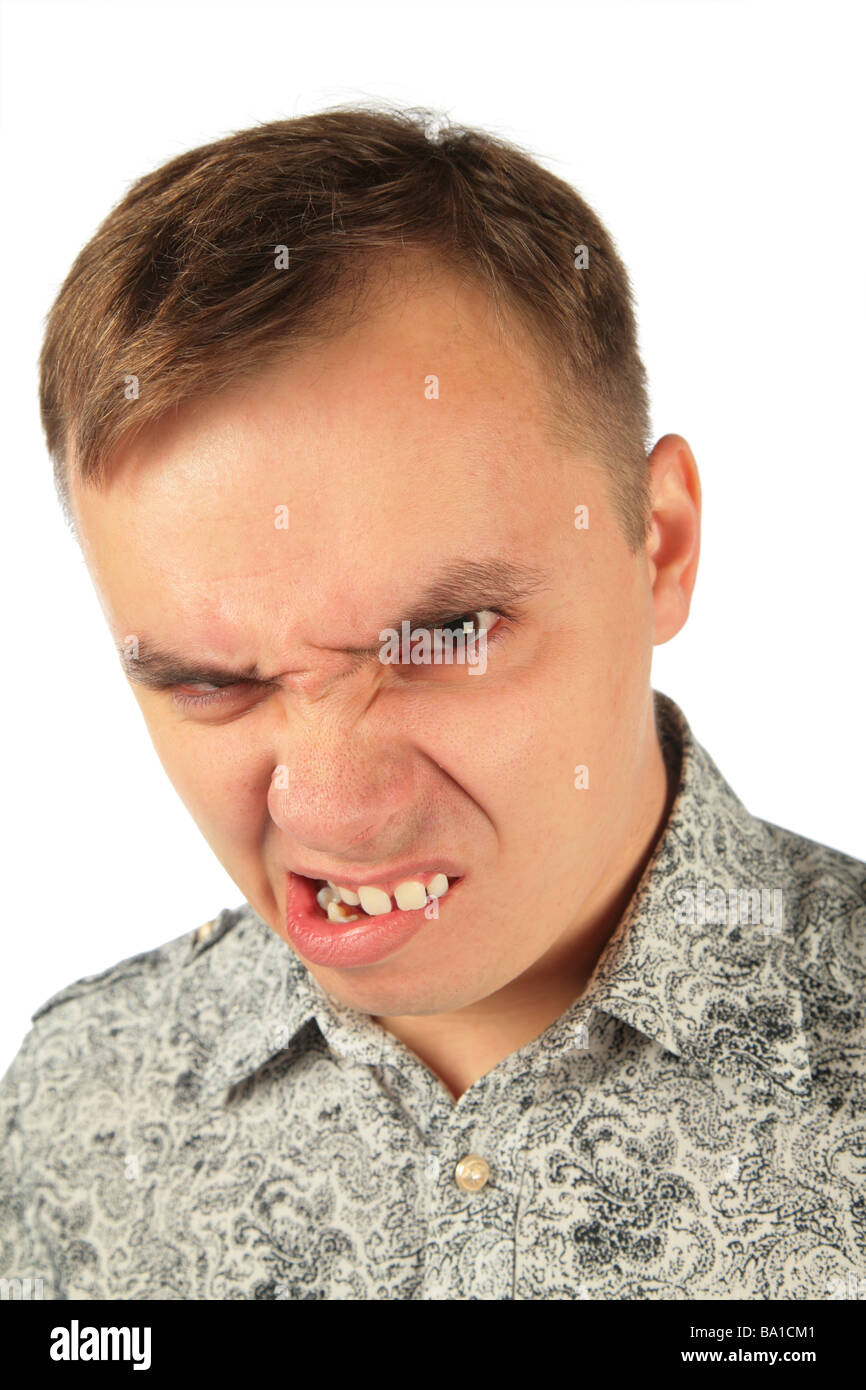 Angry man bites one's lip Stock Photo - Alamy