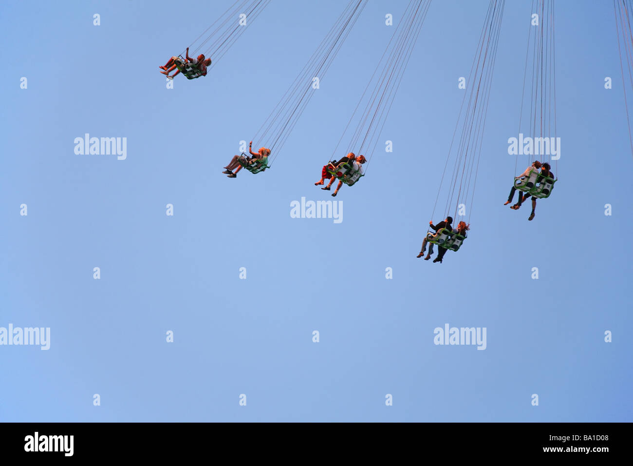 People on carousel Stock Photo - Alamy