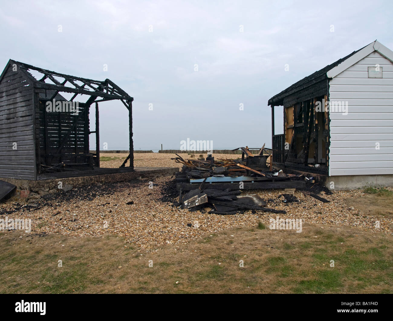 Beach huts destroyed by fire Stock Photo - Alamy