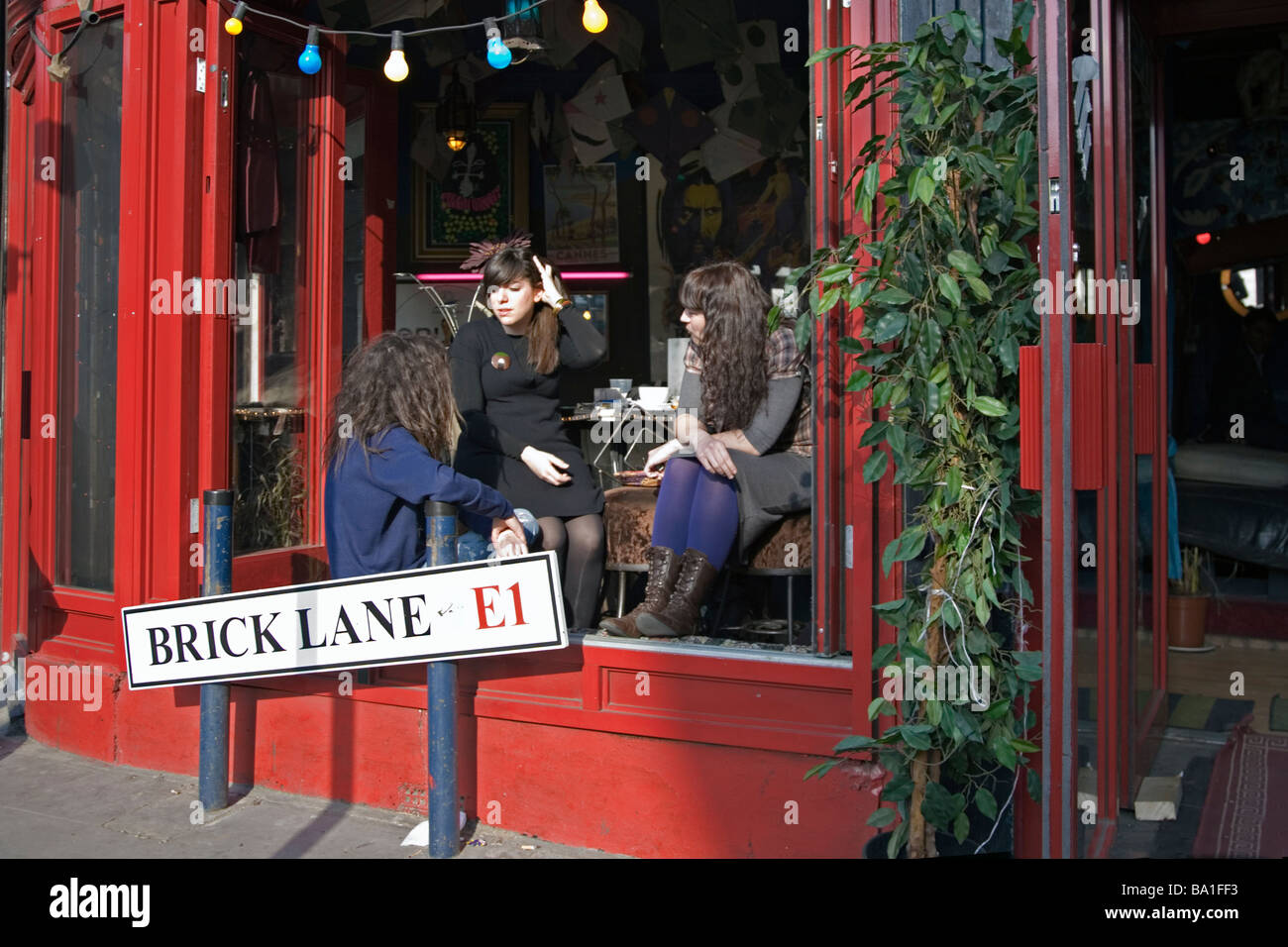 girls in a bar in brick lane in london Stock Photo - Alamy