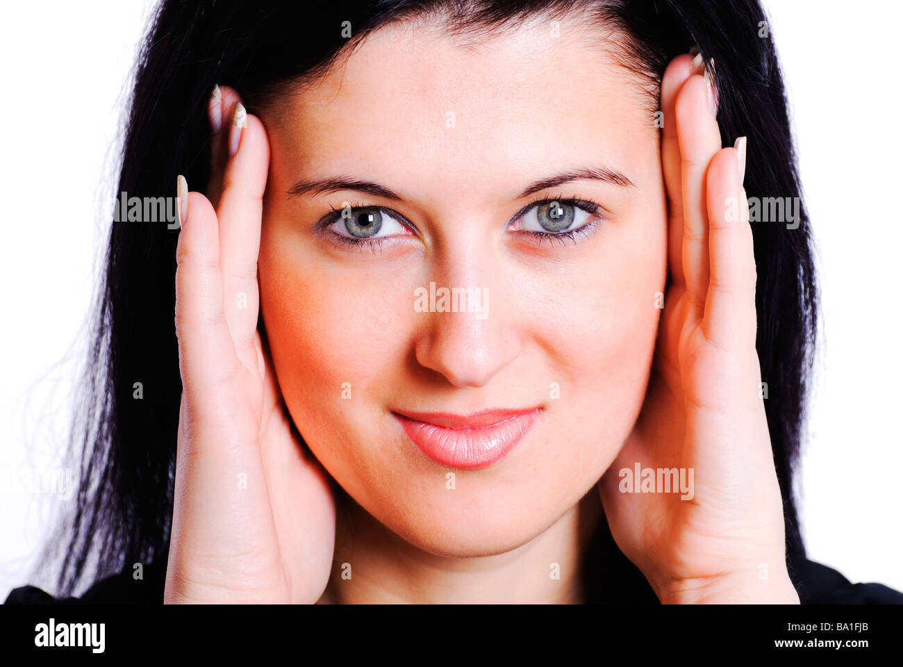 Beautiful young woman hands touching face Stock Photo - Alamy