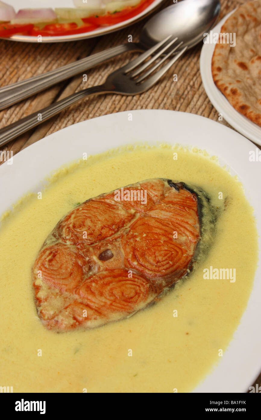 Fish Caldine is a goan yellow non spicy curry which is made of snapper ...