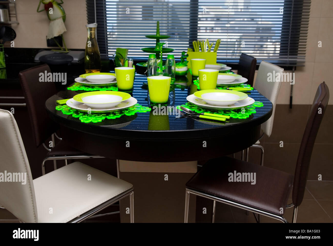 Modern kitchen table setting Stock Photo - Alamy
