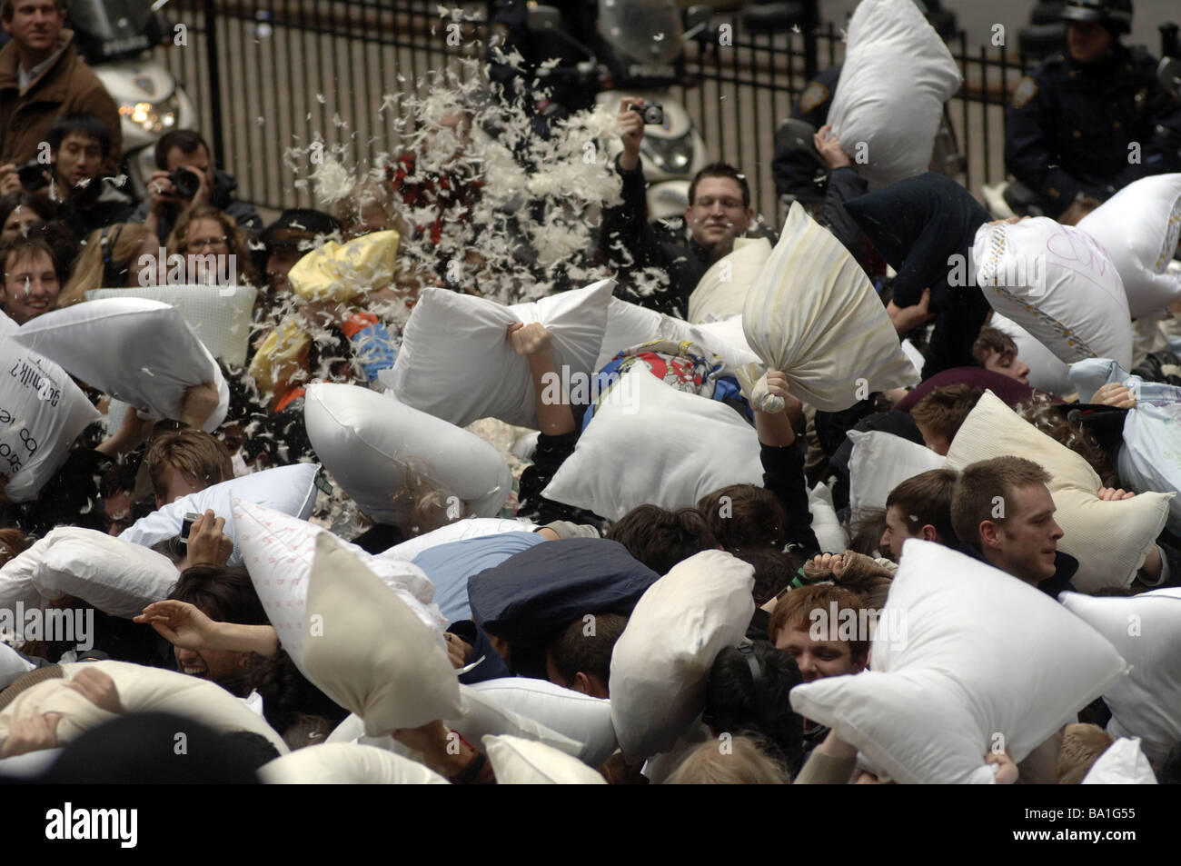Hundreds of like minded pillow fighters take out their aggression on ...