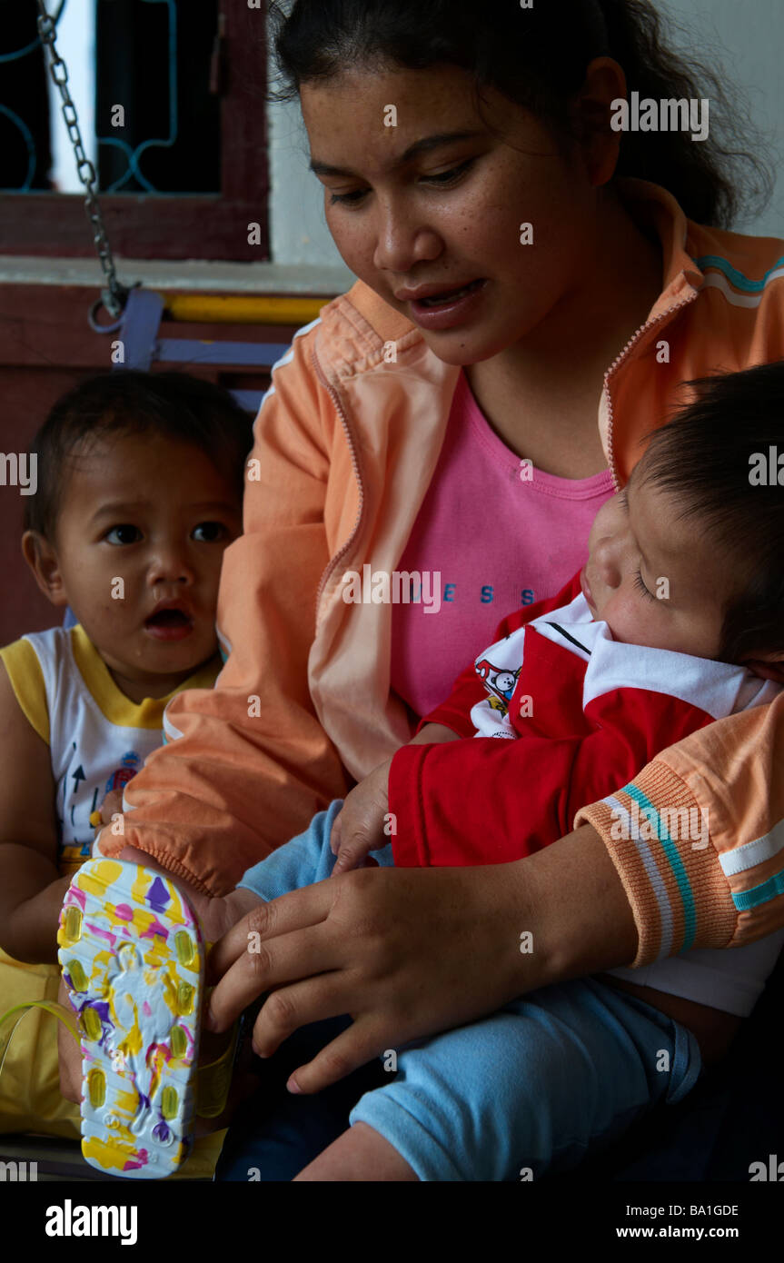 Caring for orphans hi-res stock photography and images - Alamy