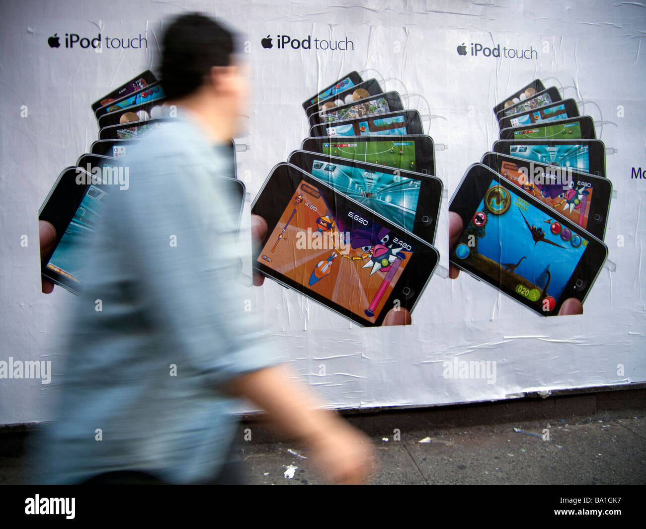 Advertising for the Apple Inc iPod Touch on a billboard in the Chelsea ...
