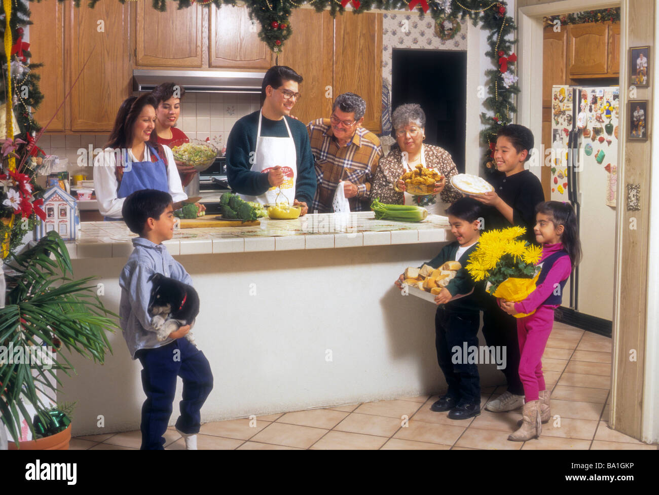 Hispanic family father cook food mother grandmother grandfather kid ...