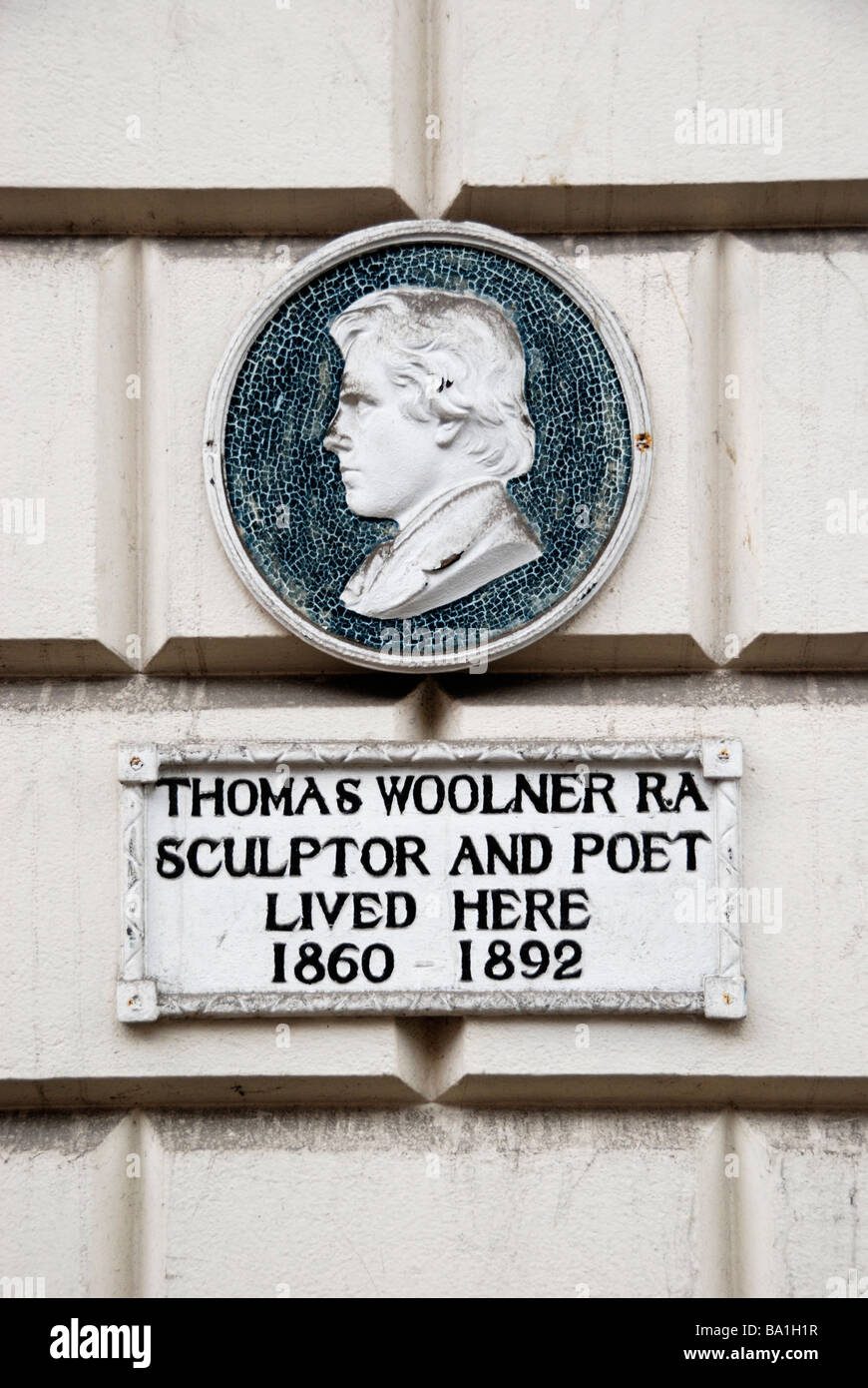 Plaque commemorating the former house of Thomas Woolner RA poet and ...