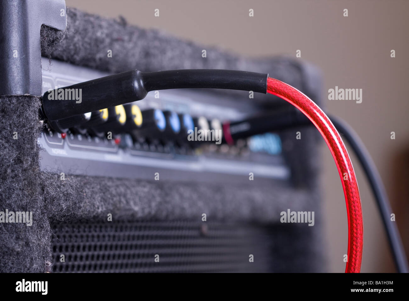 Amp with cables Stock Photo - Alamy