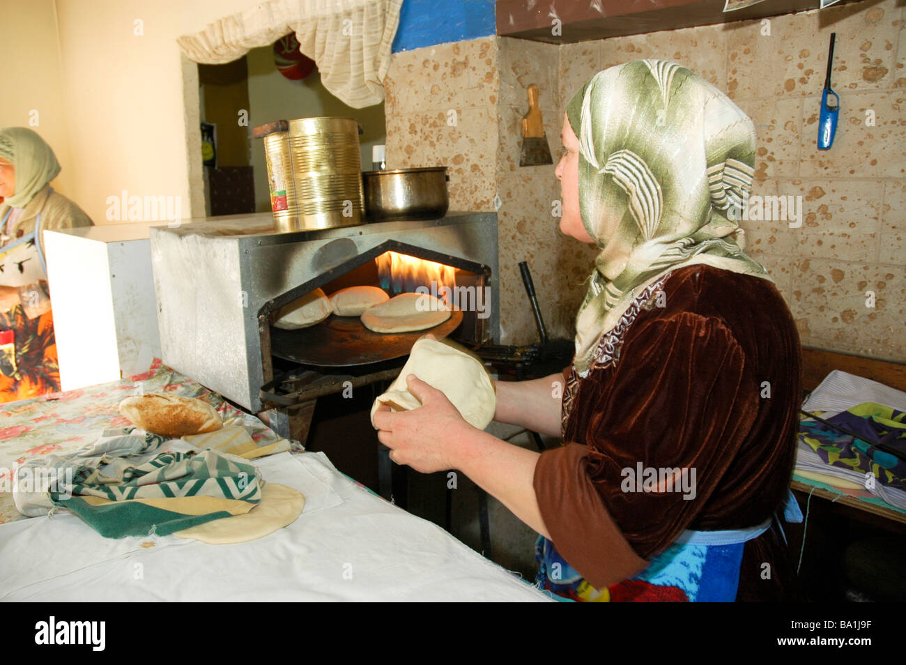Middle eastern woman baking hi-res stock photography and images - Alamy