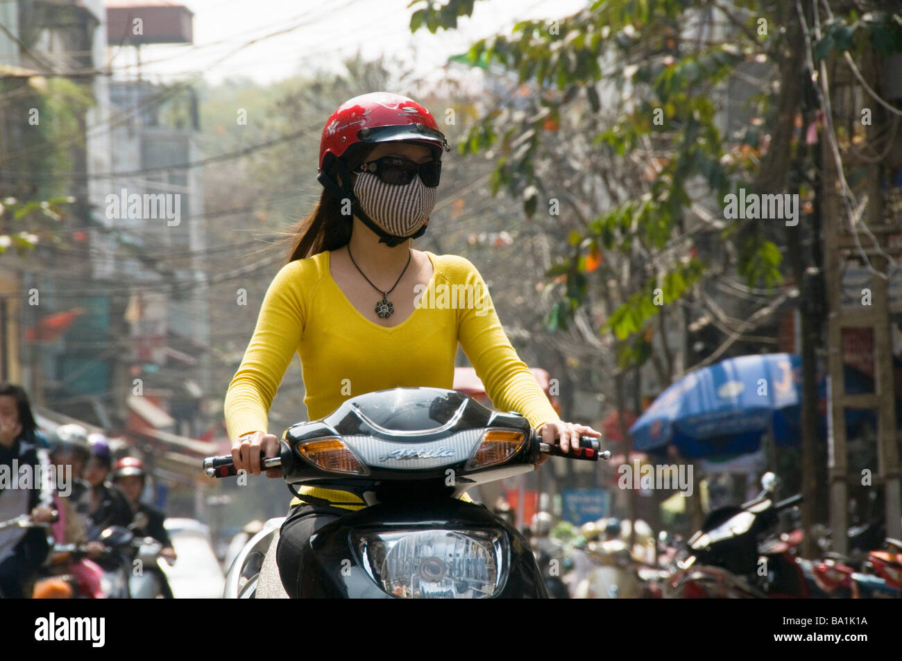motorcycle commute in Hanoi Vietnam Stock Photo - Alamy