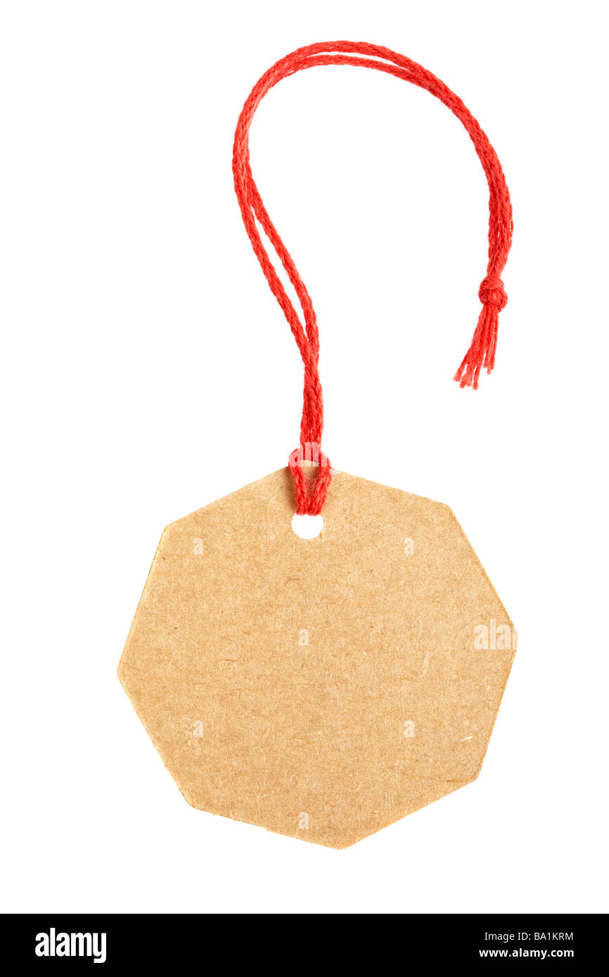 Price tag with red string isolated on white background with shallow ...