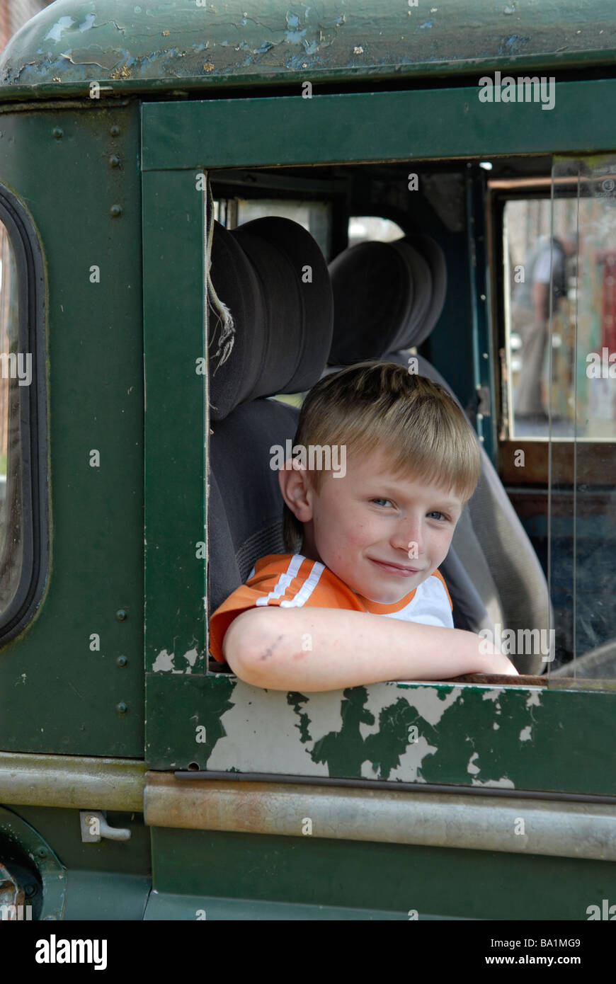 boy in old land rover Stock Photo - Alamy