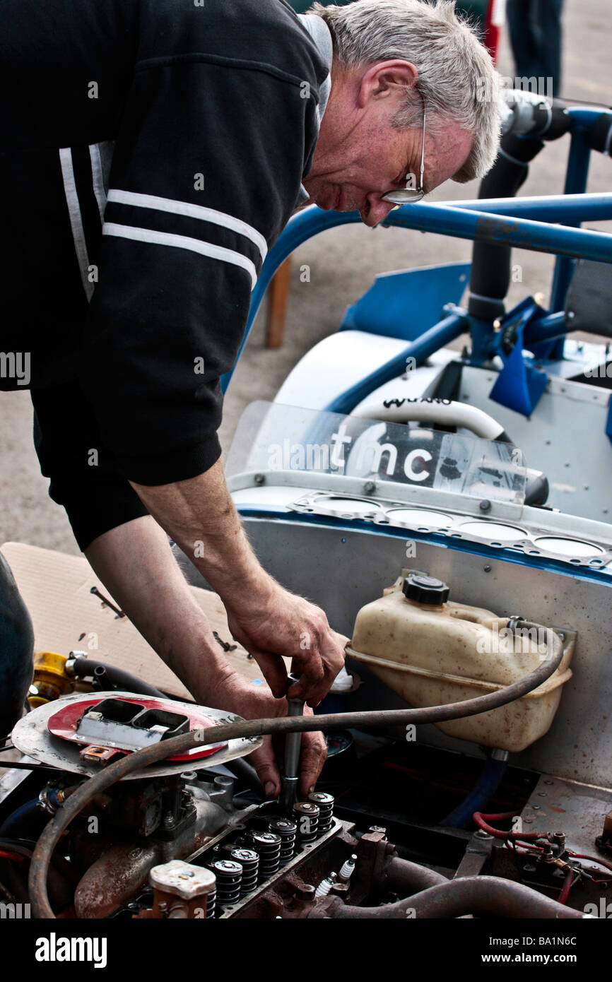 Repairing a locost racing car in the paddock at Mallory Park Stock ...