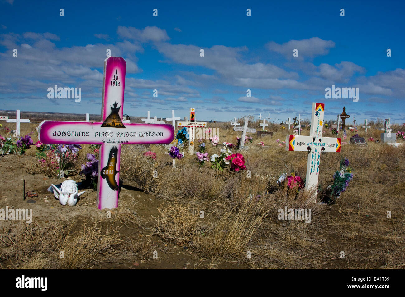 Wooden grave markers at a rural indian cemetery Fort Belknap ...
