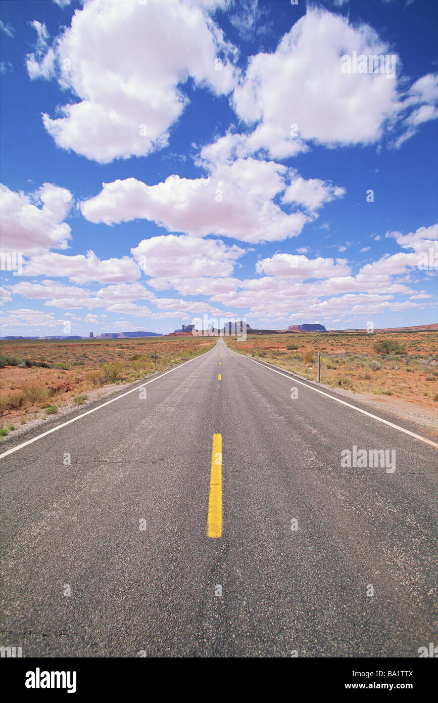 Empty Straight Road against Blue Sky Stock Photo - Alamy
