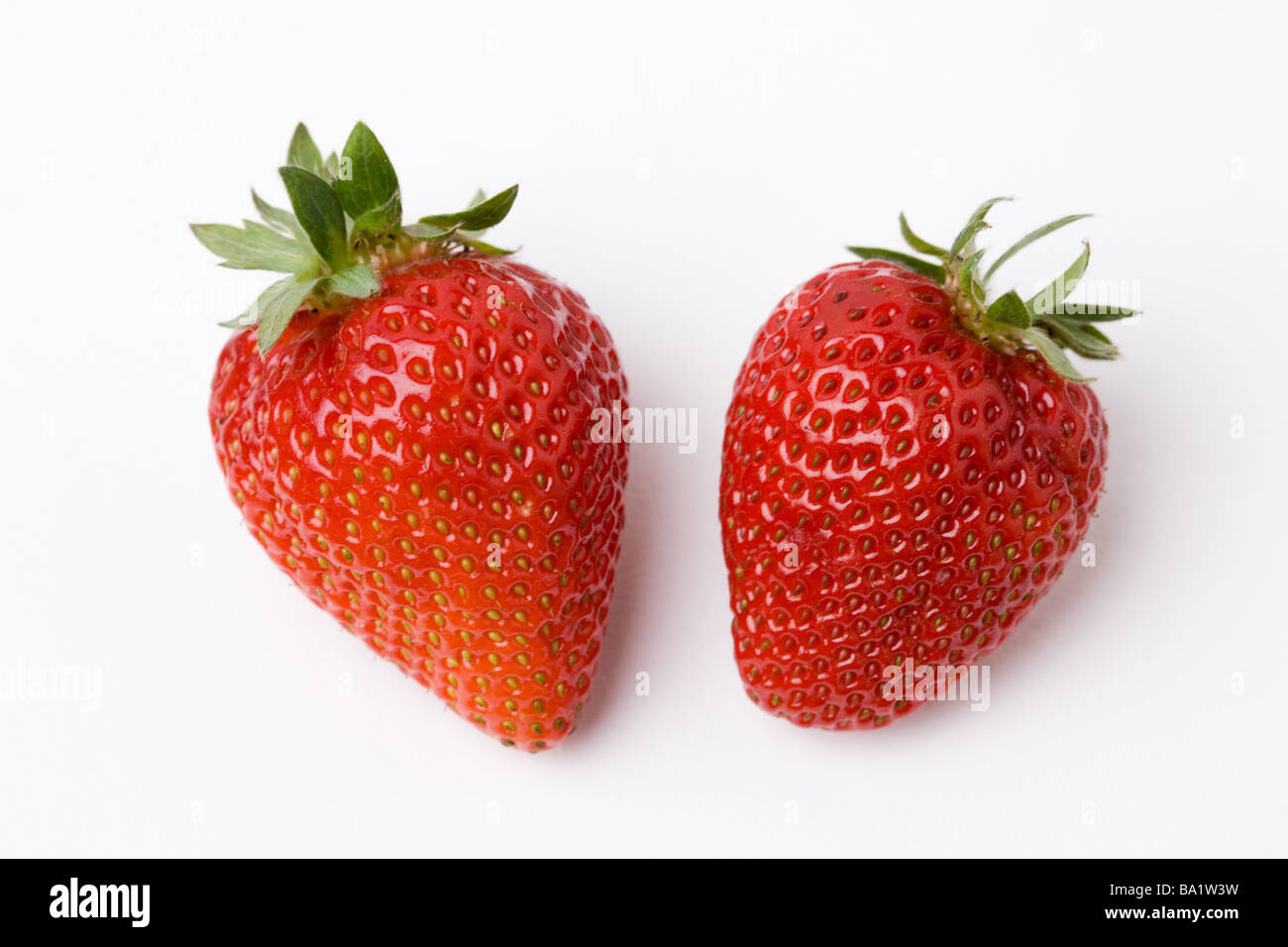 Two Red Strawberries Stock Photo - Alamy