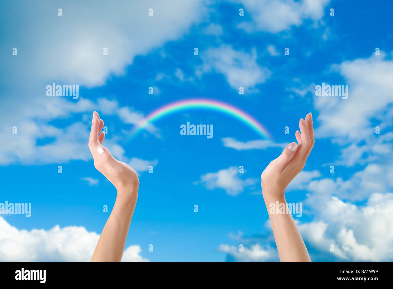 Rainbow Over Human Hands against Cloudy Sky Stock Photo - Alamy