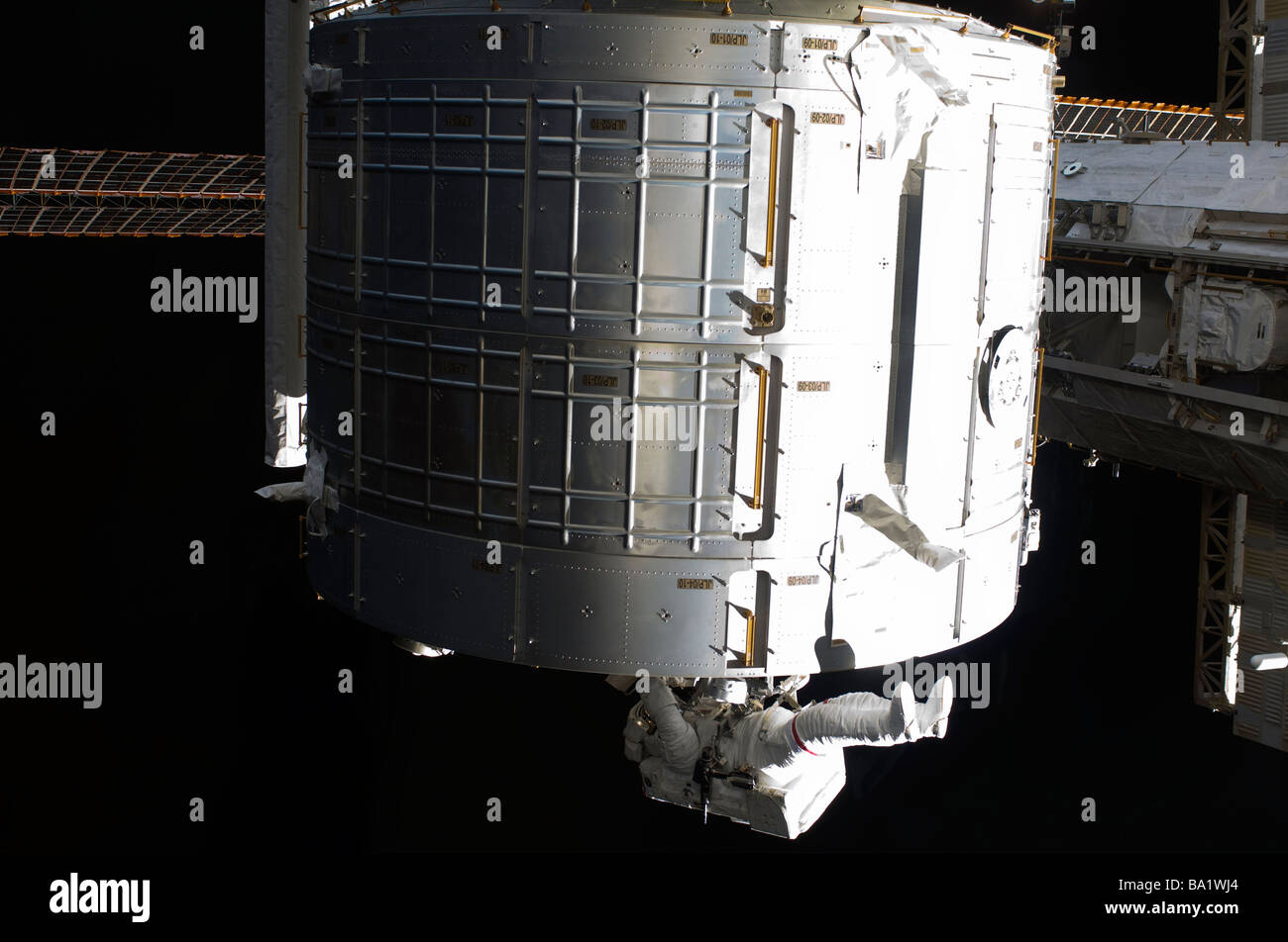 Astronaut participates in extravehicular activity Stock Photo - Alamy