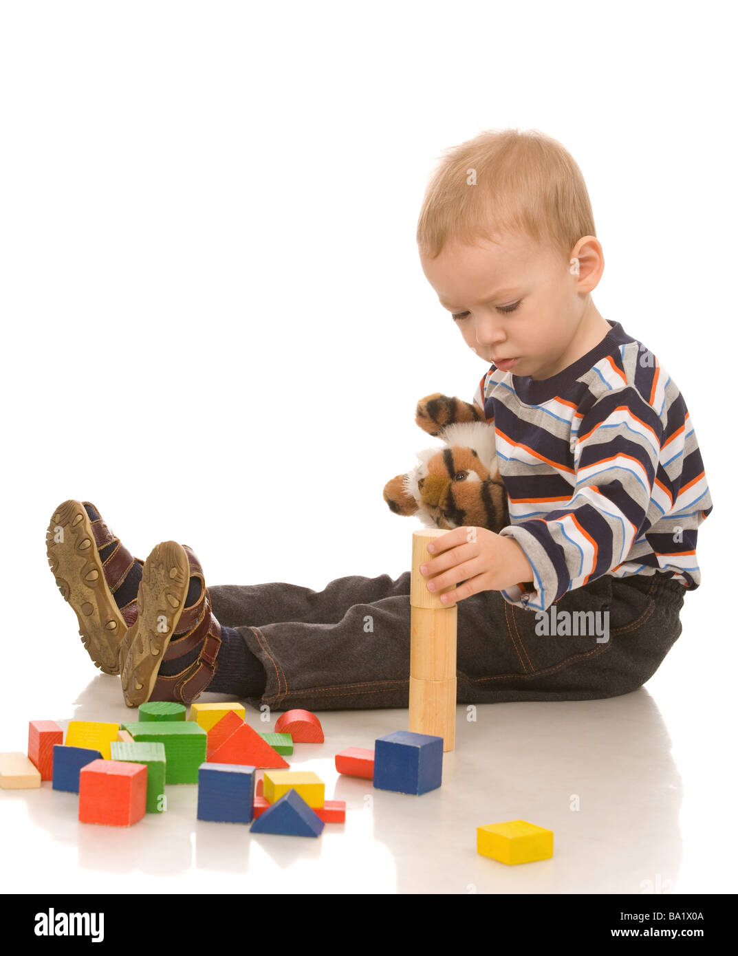 little boy play with bricks Stock Photo - Alamy