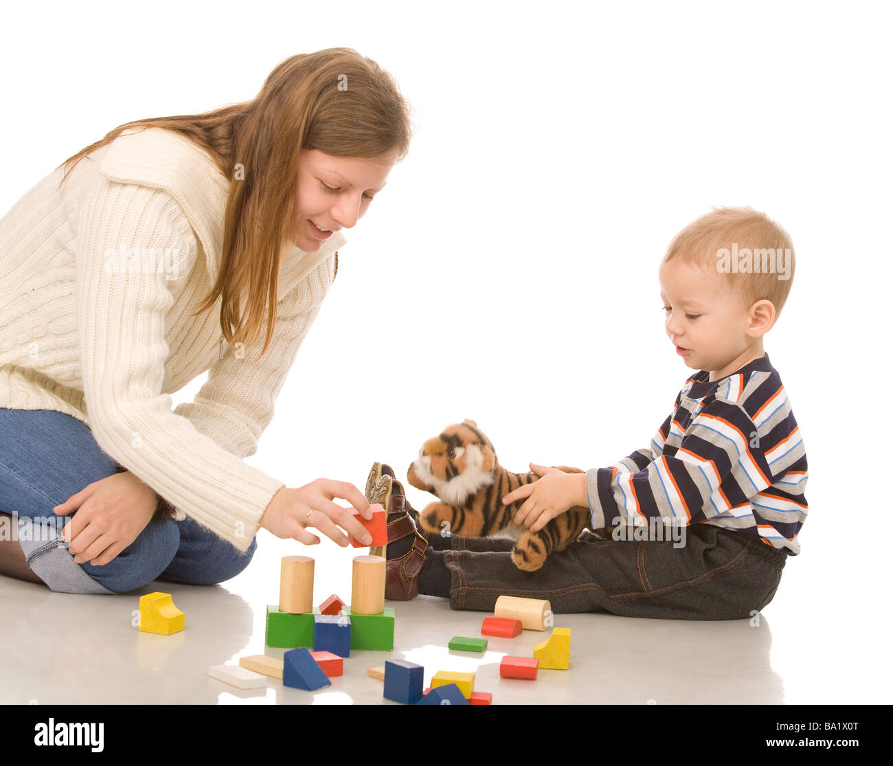 mother and son play with bricks Stock Photo - Alamy