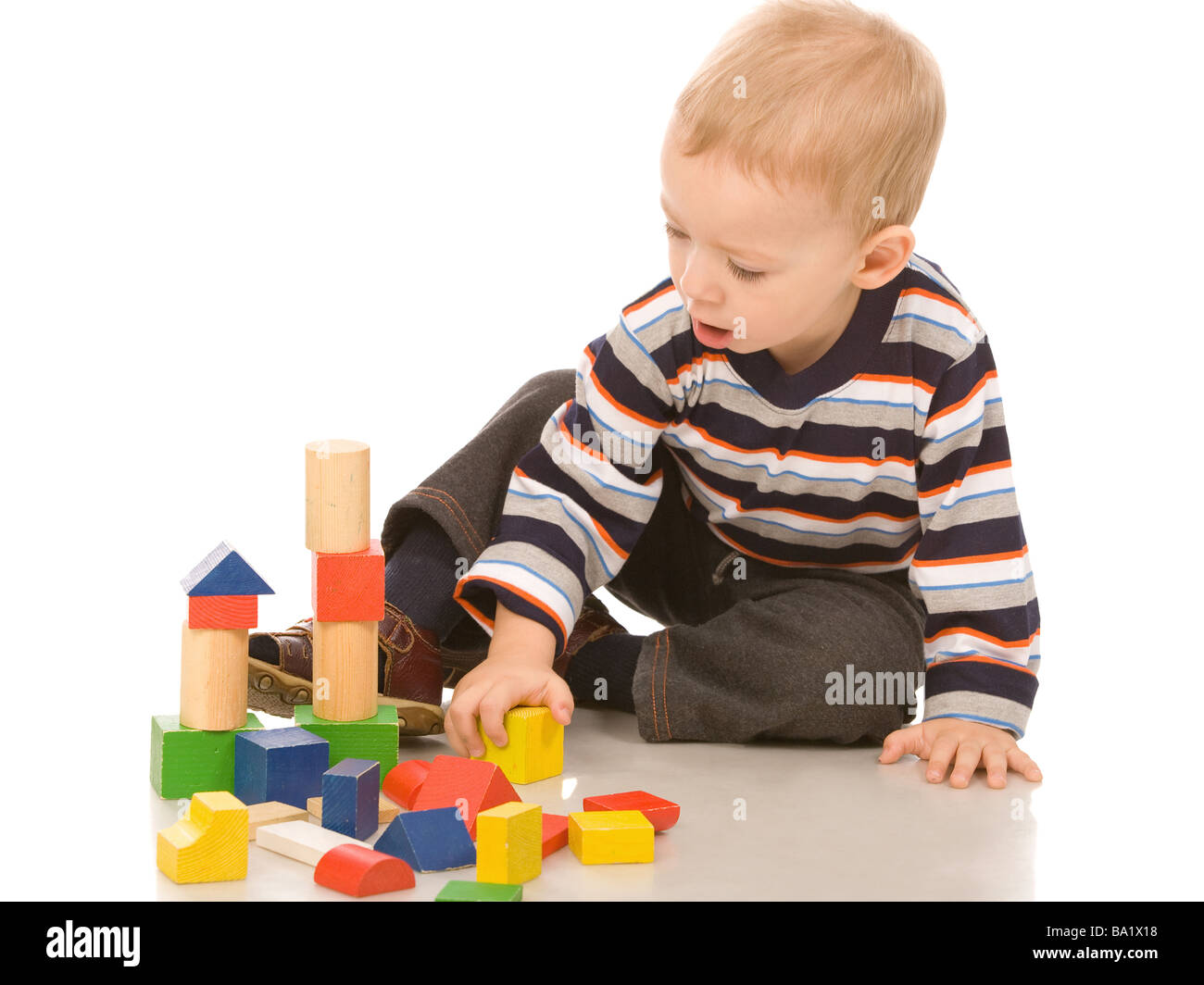 little boy play with bricks Stock Photo - Alamy