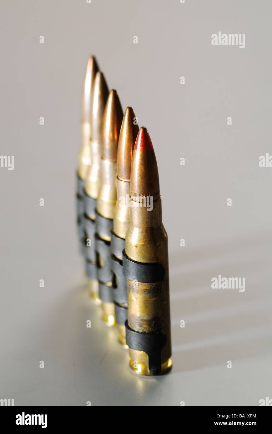 Machine gun bullets link Stock Photo - Alamy