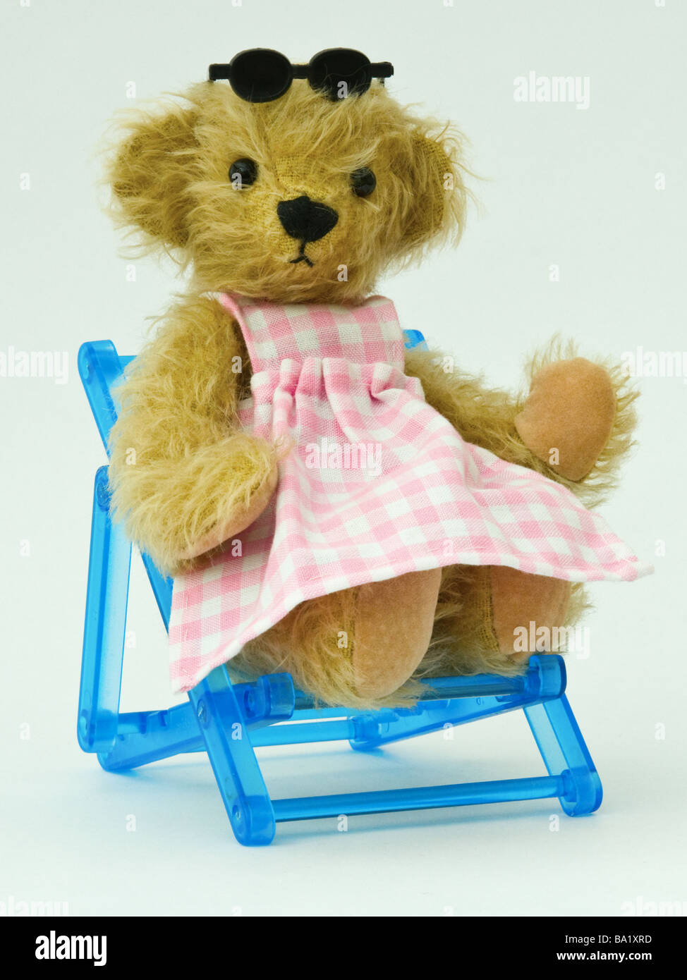Miniature female teddy sitting in a deck chair (Mini Bear Collection ...
