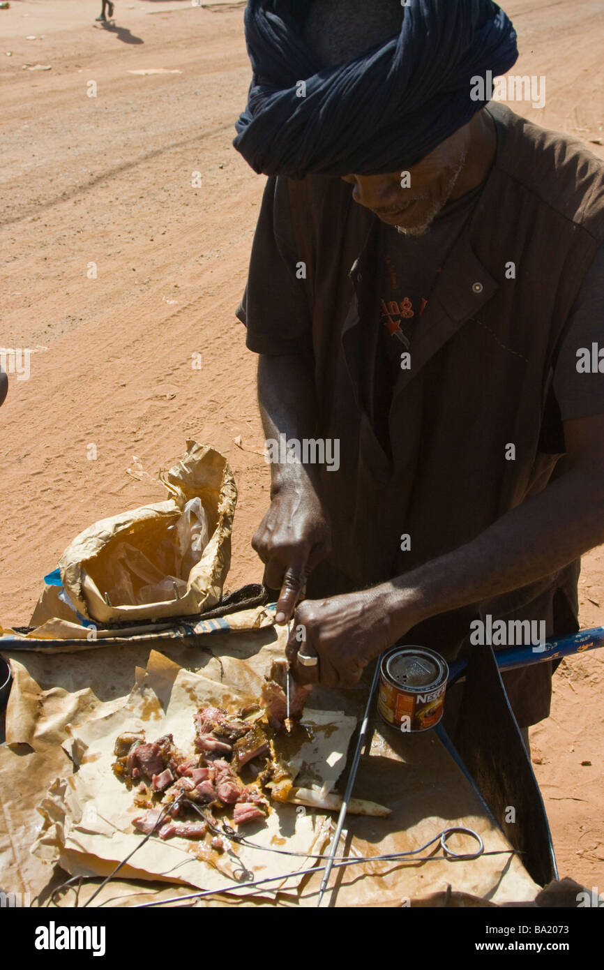 Senegalese Man Selling Roast Mutton in Senegal West Africa Stock Photo ...